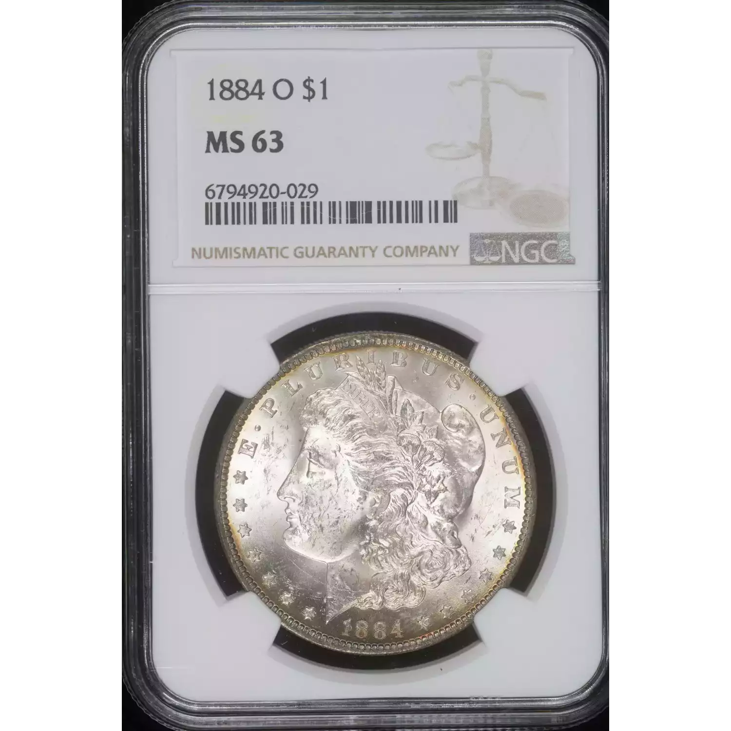 1884-O Morgan Silver Dollar NGC MS-63 - Hertel's Coins Inc.